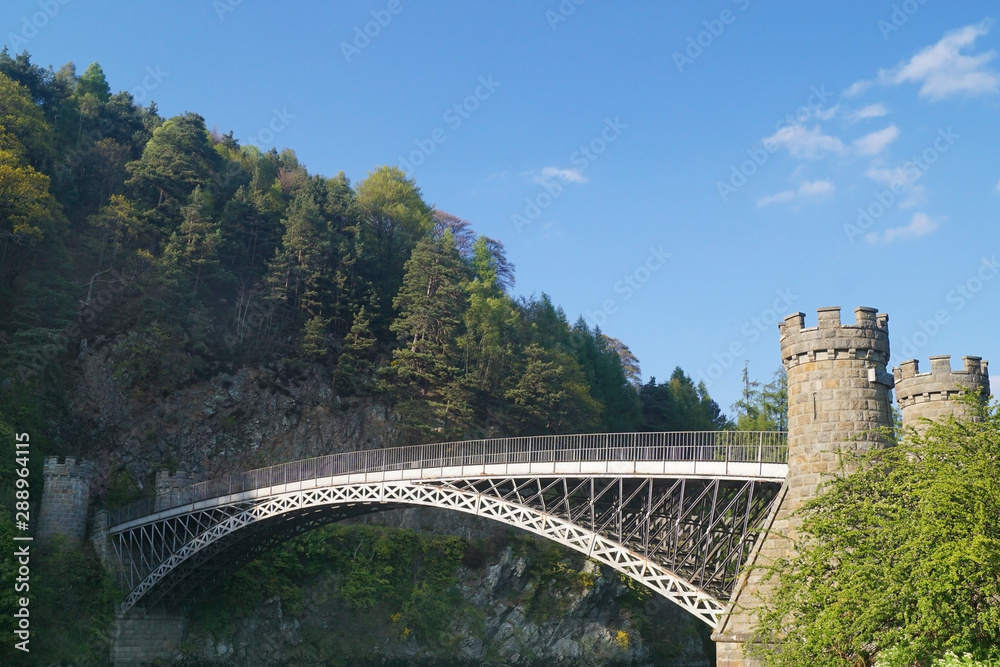 The cast iron arch bridge in Craigellachie in the Speyside in Scotland ...