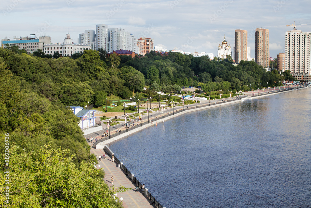 Amur River embankment in sports and park complex of city of Khabarovsk, Russia. On summer day ...