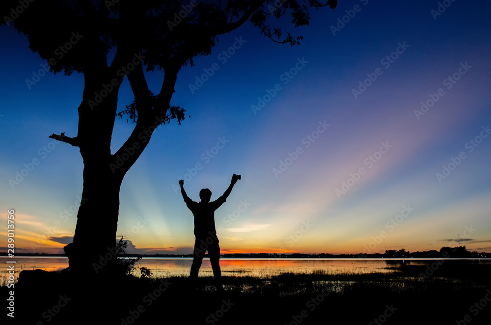 Silhouette of freedom photographer, person back view standing with ...
