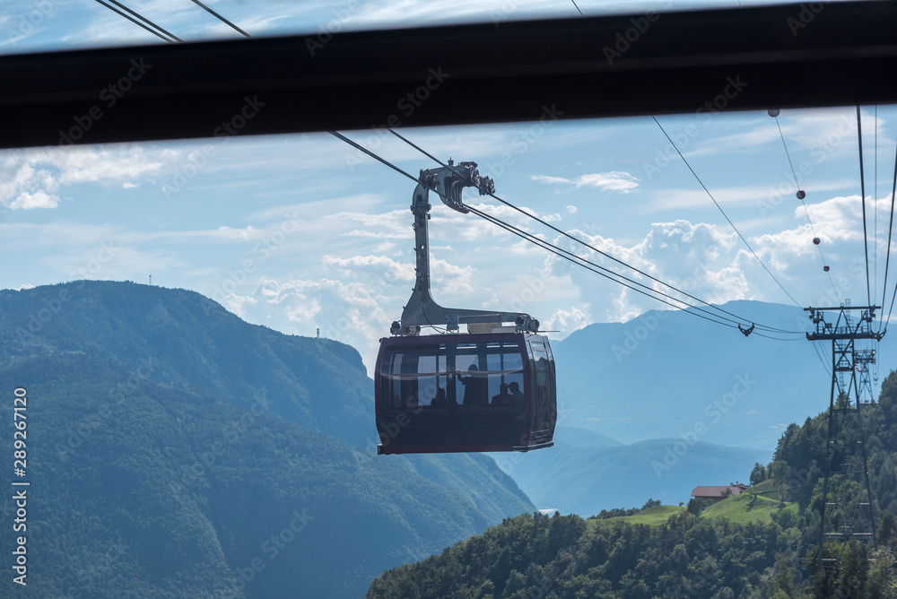 cable car with people in the alps Stock Photo | Adobe Stock