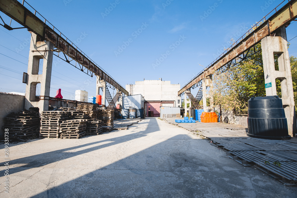 Old wooden pallet and rusty mechanisms in the workshop of an old ...