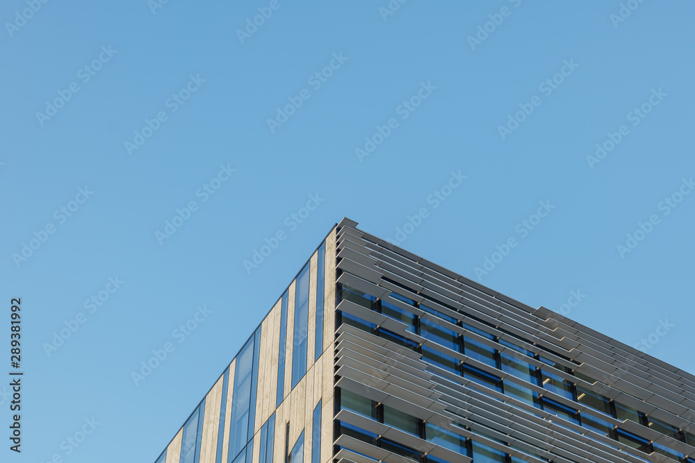 Low angle and close up detail of two different facade with 2 types of ...
