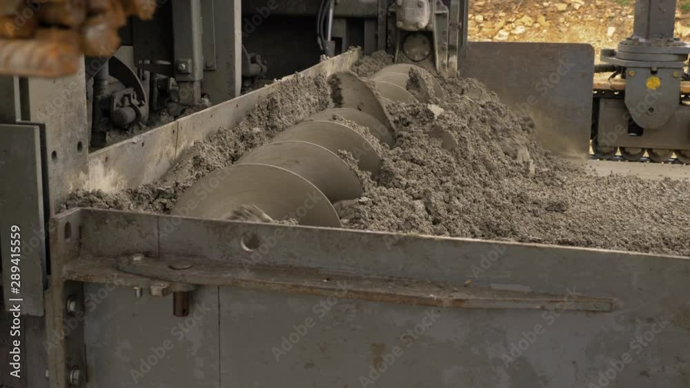 Fully mechanised process of concrete pavement construction. The ...