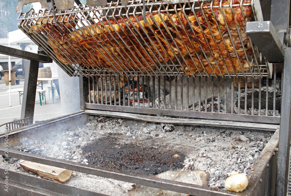 Roasted pork meat. Swine, pig, hog, sow on a barbeque. Grilled meat ...