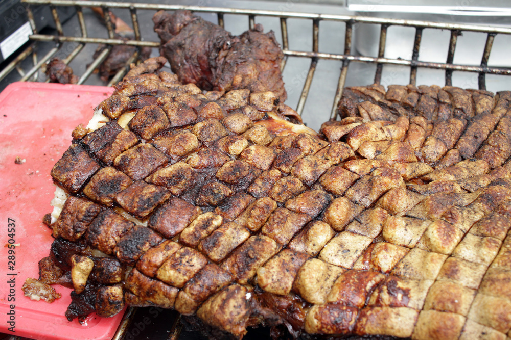 Roasted pork meat. Swine, pig, hog, sow on a barbeque. Grilled meat ...
