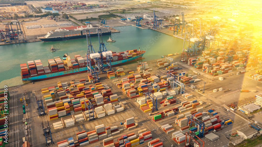 Container ship in export and import business logistics and ...