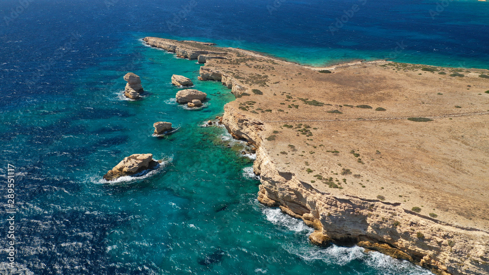 Aerial drone photo of small islet of Glaronisi with paradise emerald ...