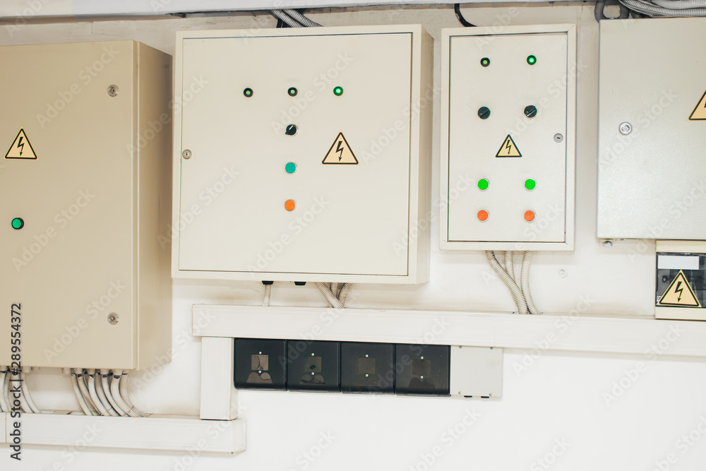 Electrical control panel boxes. The switchboard is located on the ...