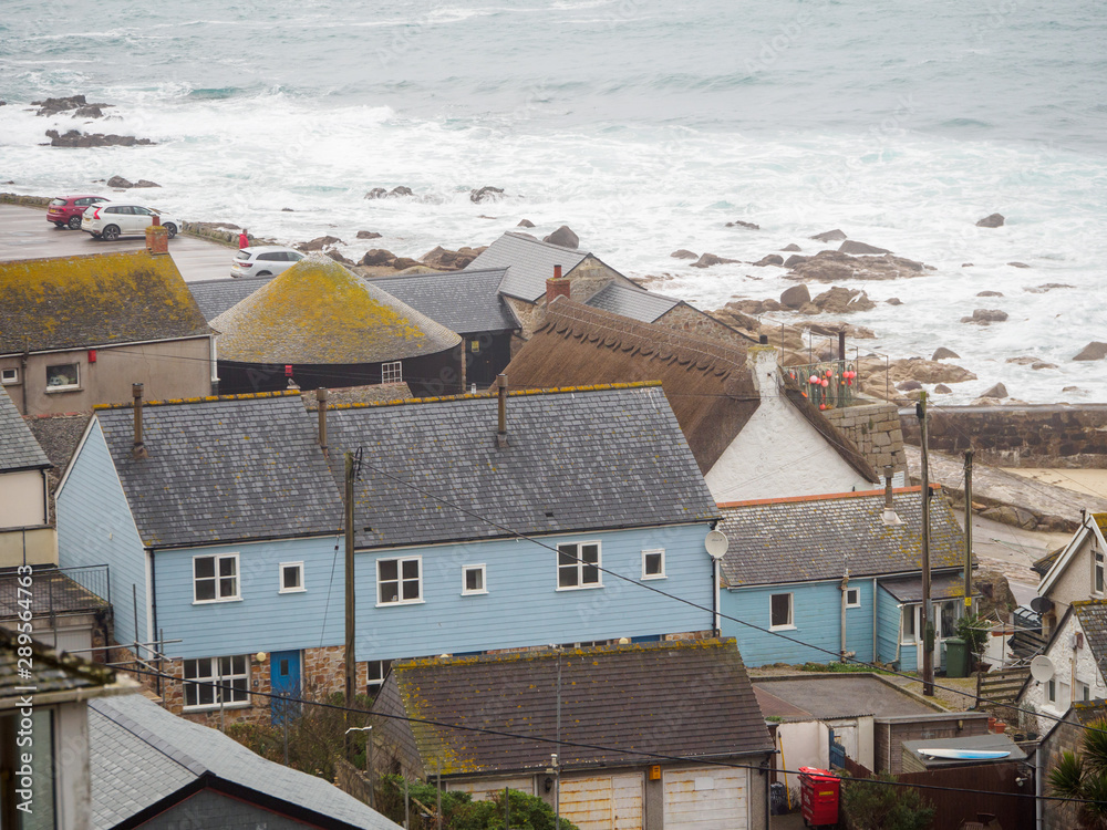 Wide aerial view of traditional wooden buildings with shingled roofs ...