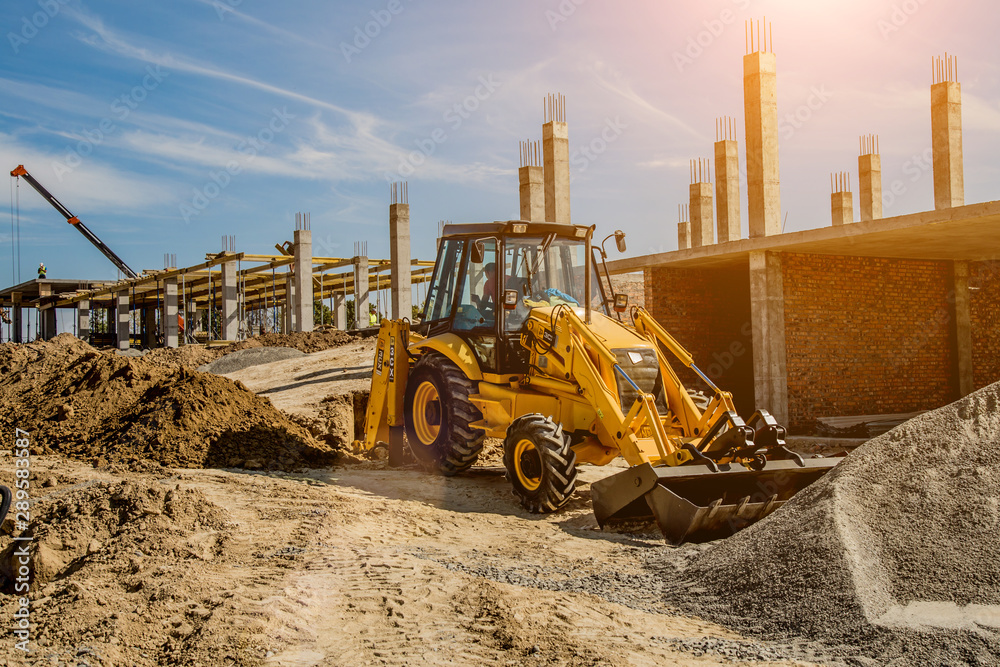Construction site background. Hoisting cranes and new multi-storey ...