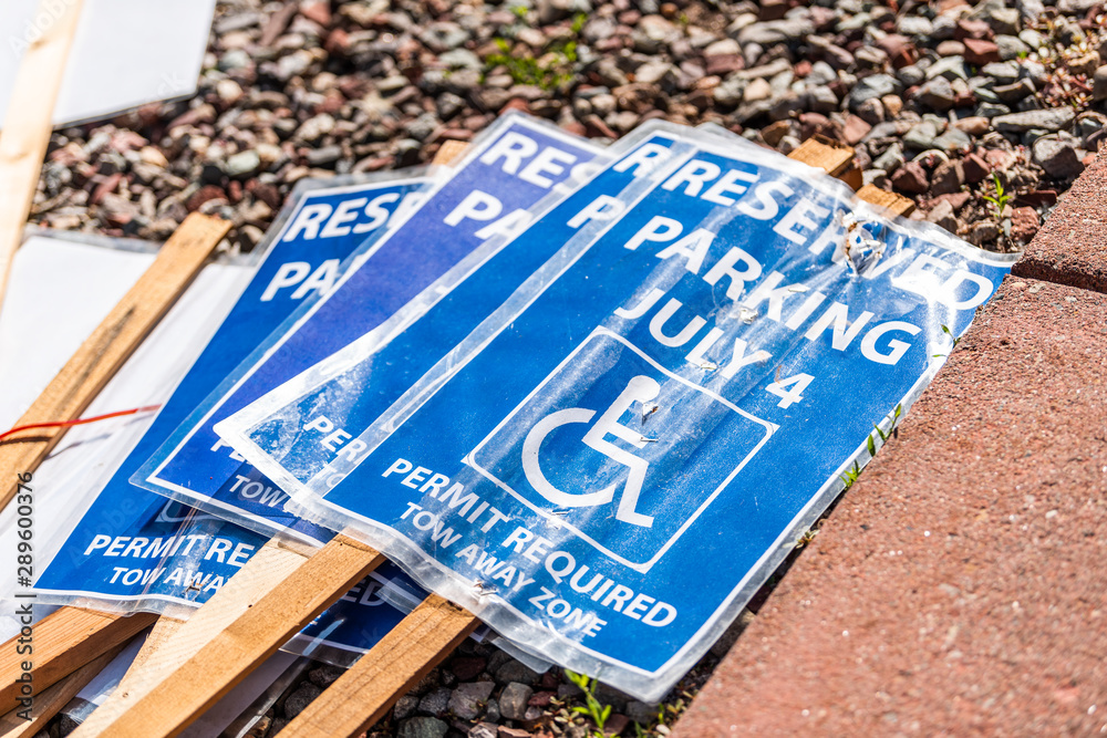 Signposts on ground for July 4th Independence day disabled parking ...