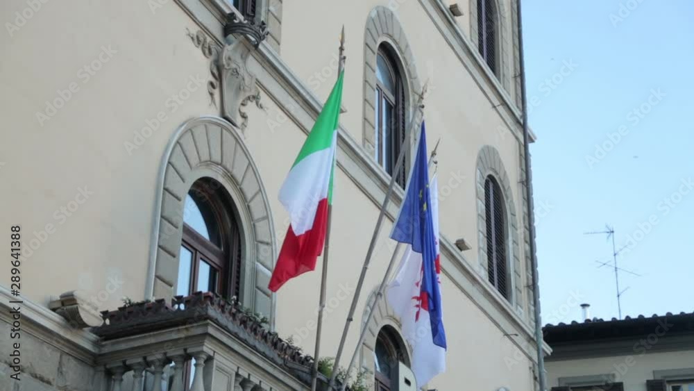 Italian Embassy with flags over the entrance. Italian flag flying in ...