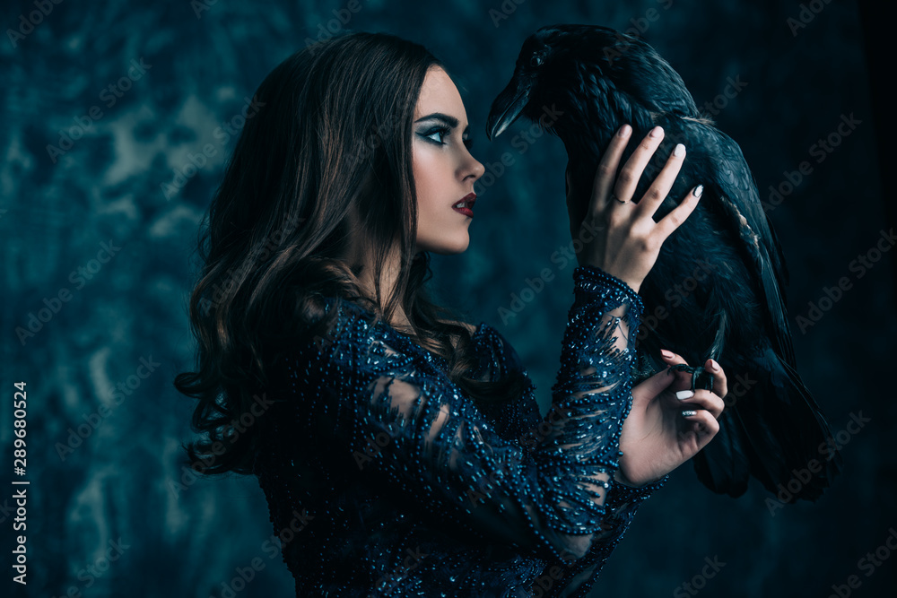 witch and bird Stock Photo | Adobe Stock