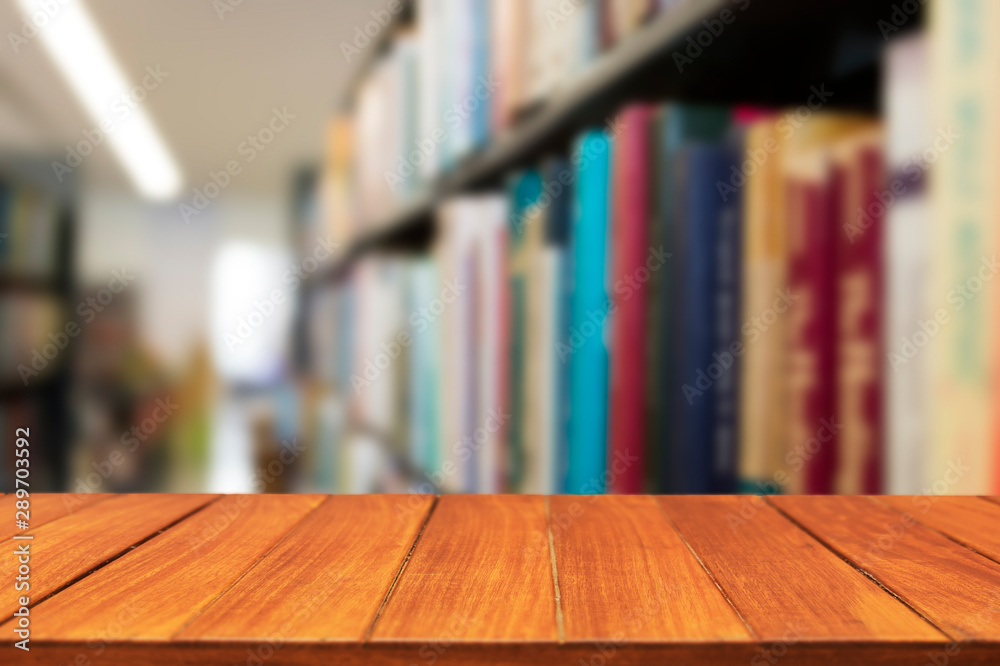 Wood table top on blur book shelf in library background Stock Photo ...