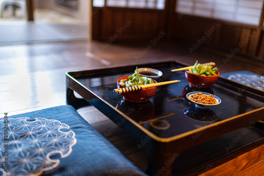 Traditional Japanese restaurant ryokan kaiseki with vegetable dish of ...