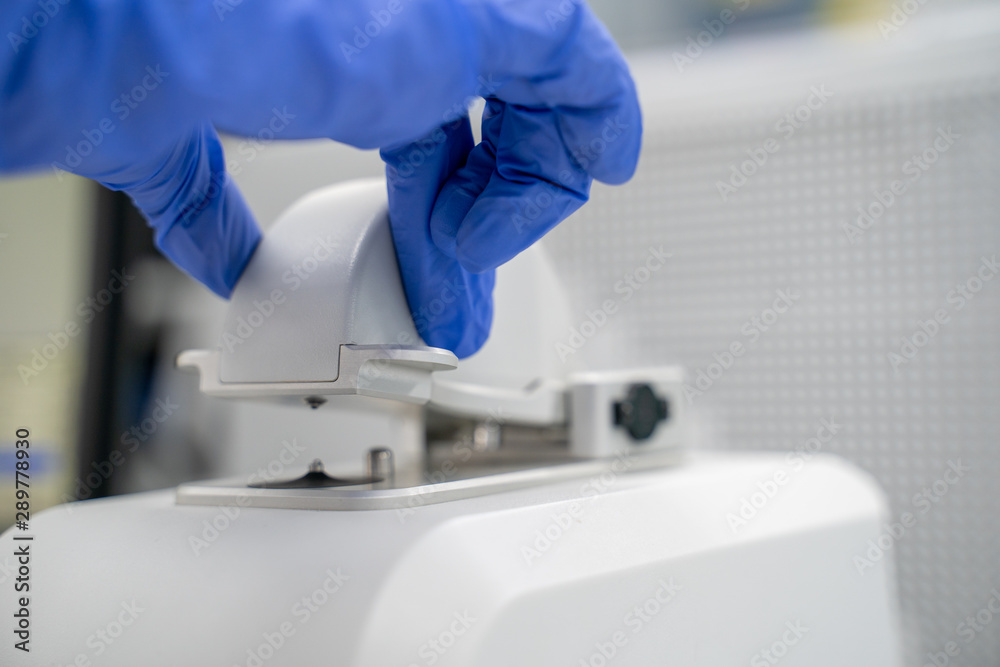 The researcher drops 2 micro-liters of the sample on pedestal to ...