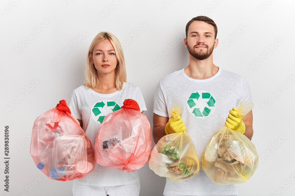 young ambitious people taking care of environment. close up portrait ...
