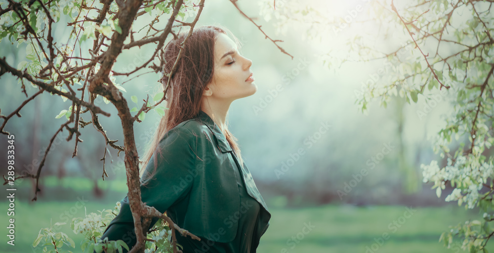 Beauty young woman enjoying nature in a garden, Happy Beautiful ...