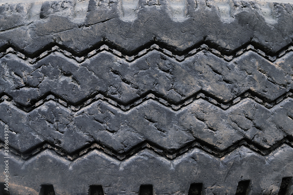 close up old damaged and worn black tire tread truck. Tire tread ...