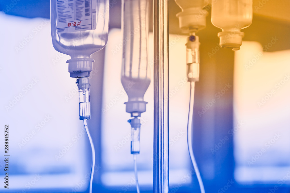 slow intravenous drug administration system, hospital ward, soft focus ...