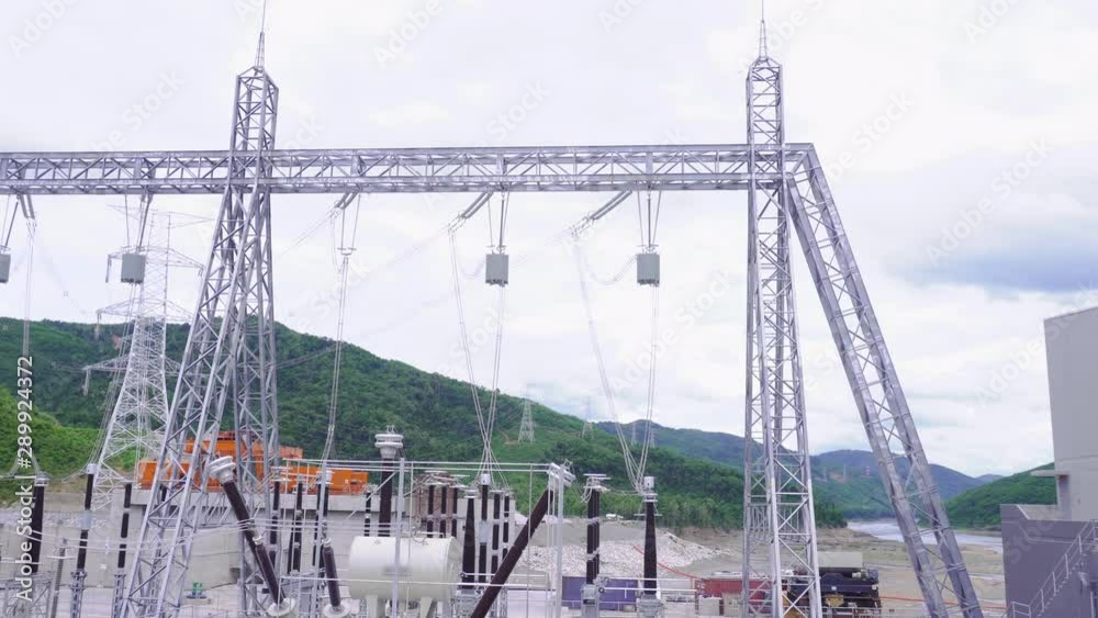 High voltage transformer at the hydroelectric dam.Large power ...