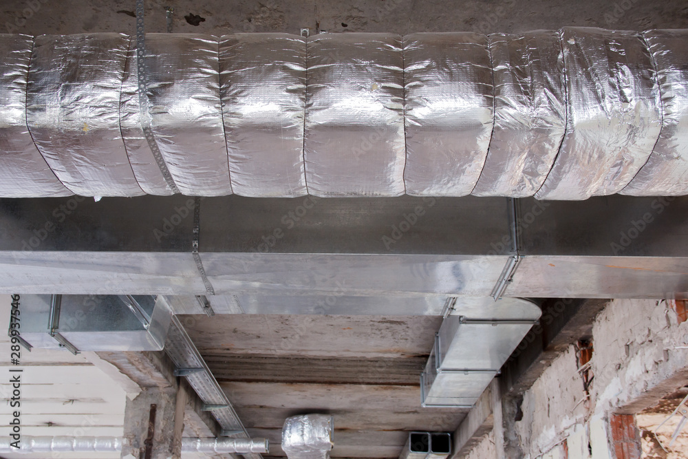 Installation of ventilation ducts during the construction of a new ...