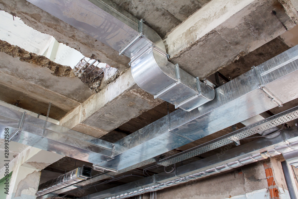 Installation of ventilation ducts during the construction of a new ...