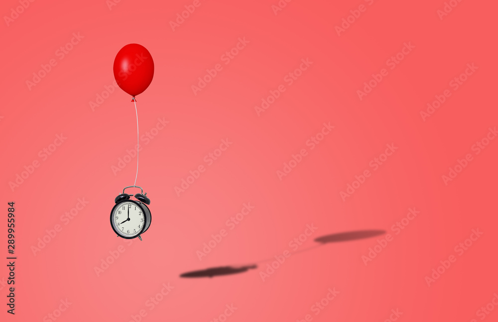 Time Management Concept : Retro black alarm clock tied to balloon and ...
