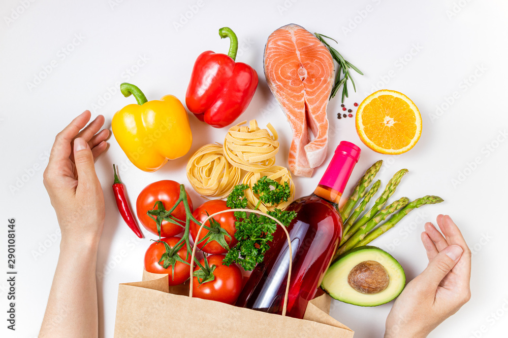 Shopping healthy food and female hands. Healthy food in paper bag fish ...