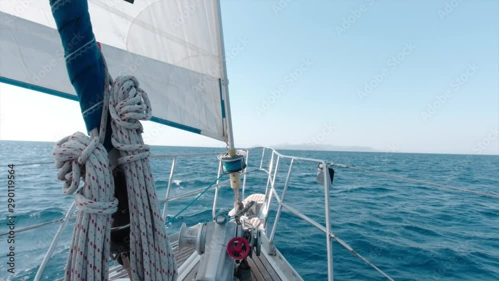 An Aigina Sailing Trip with a big yacht going towards the sky horizon ...