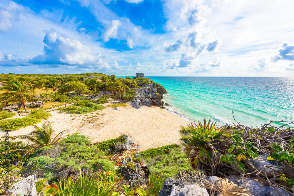 Mayan ruins of Tulum at tropical coast. God of Winds Temple at paradise ...