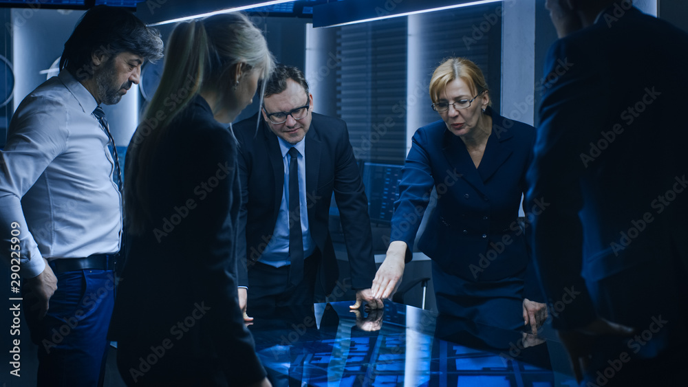 Diverse Team of Government Intelligence Agents Standing Around Digital ...