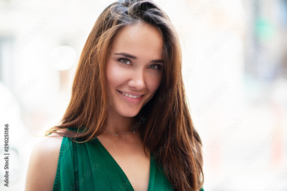 Young pretty likable cheerful woman posing summer city outdoor ...