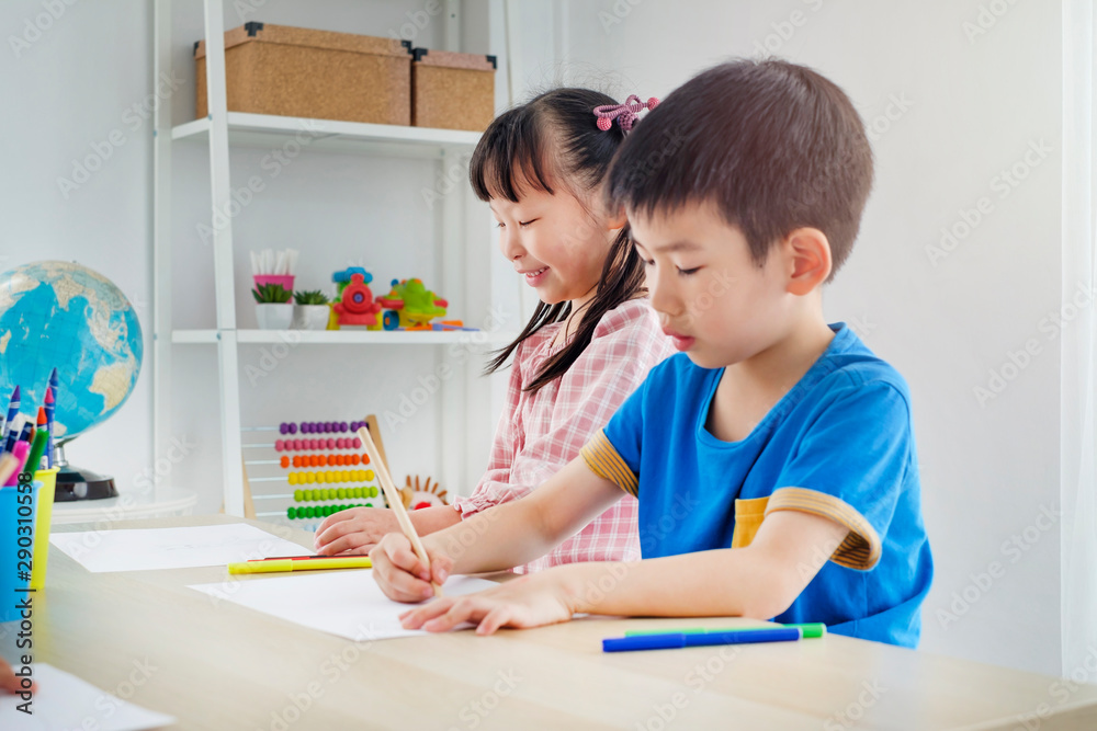 Children play drawing in playroom at school Stock Photo | Adobe Stock
