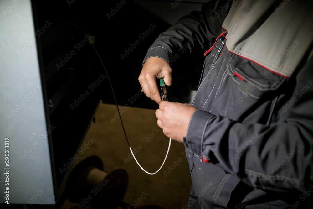 The technician attaching fiber optic on the Optical Distribution Frame ...