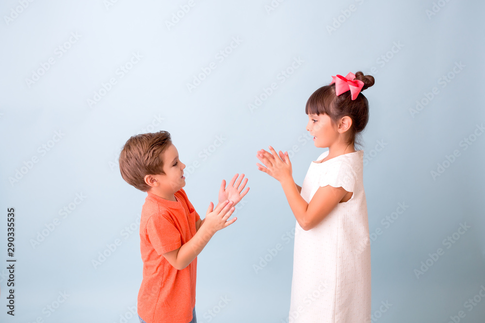 Two Kids Playing Hand Clapping Games Stock Photo | Adobe Stock