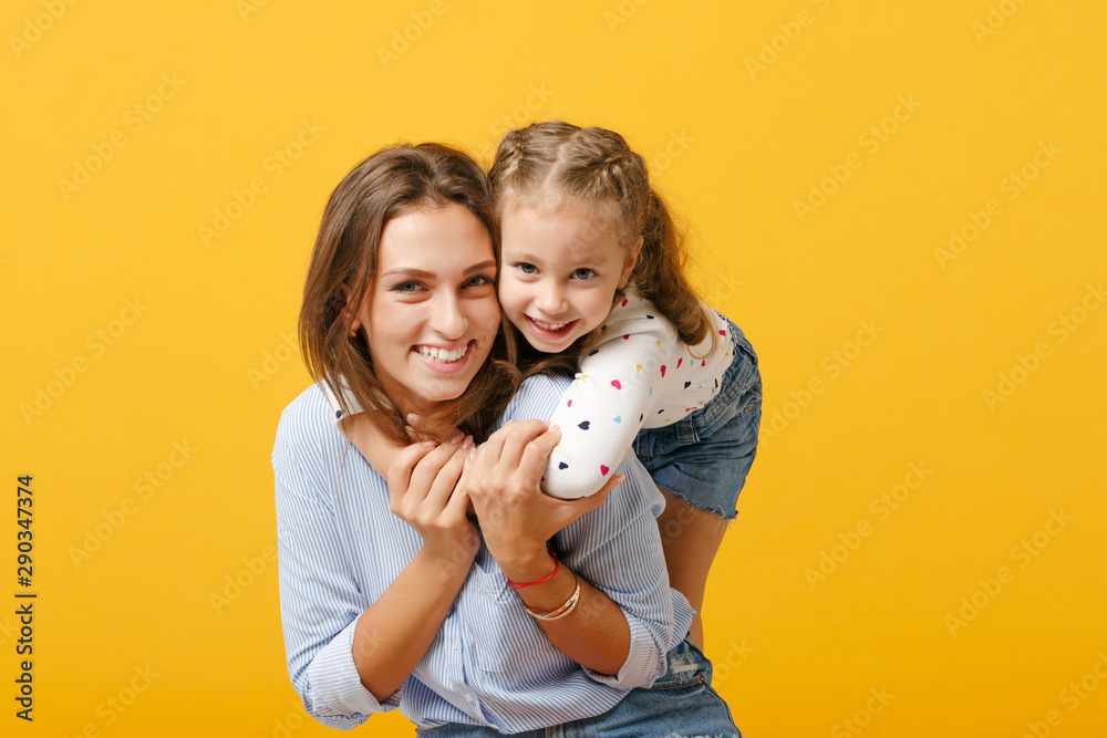 Woman in light clothes have fun with cute child baby girl 4-5 years old ...