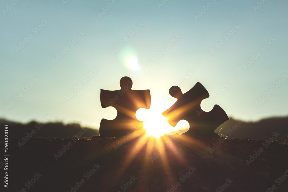 connect couple puzzle piece with sunset background. empty copy space ...