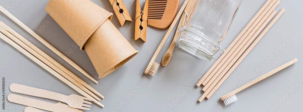 eco natural paper cups, straws, toothbrush flat lay. Banner for web ...