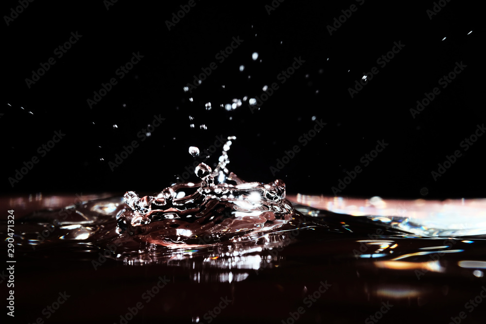 drops of water falling creating spectacular forms background Stock ...
