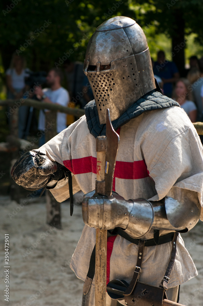 Medieval knight in the arena. Medieval knight prepare to battle at the ...