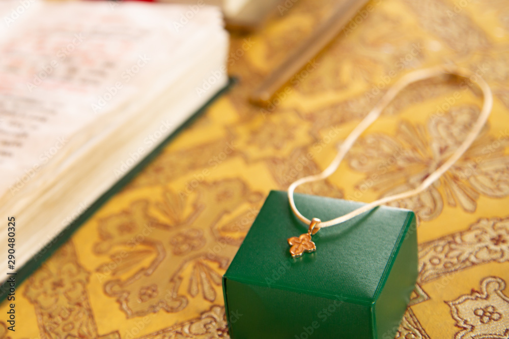 Newborn baby baptism in Holy water. baby holding mother's hands. Infant ...
