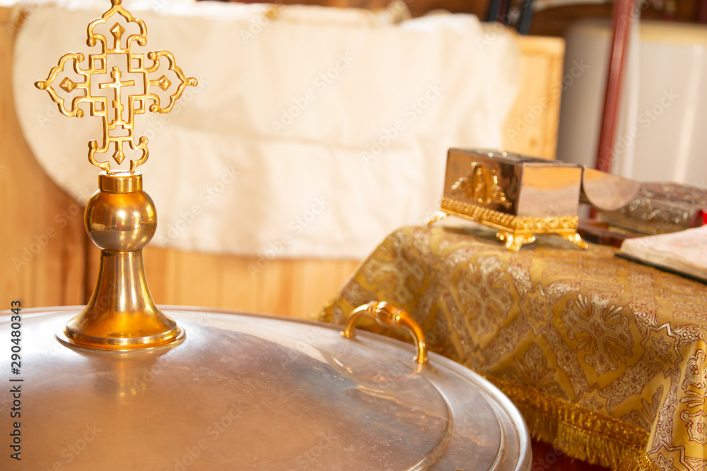 Newborn baby baptism in Holy water. baby holding mother's hands. Infant ...