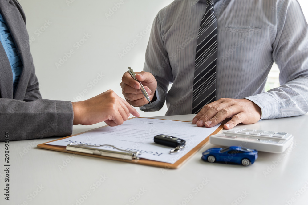 Car dealership provides advice about insurance details and car rental ...