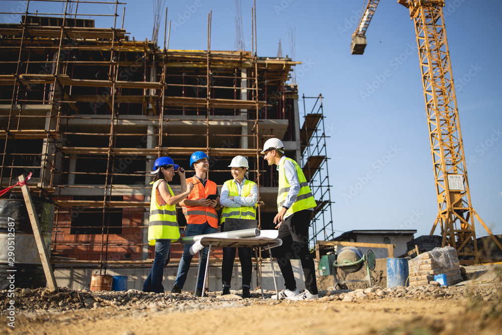 Four construction workers having meeting,stock photo Stock Photo ...
