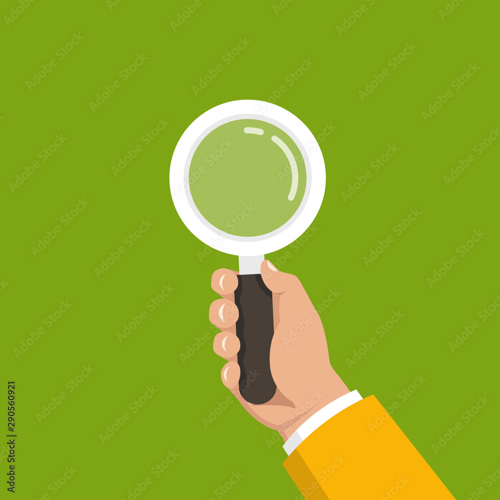 Hand holding a magnifying glass. Audit, analysis, inspection concepts ...