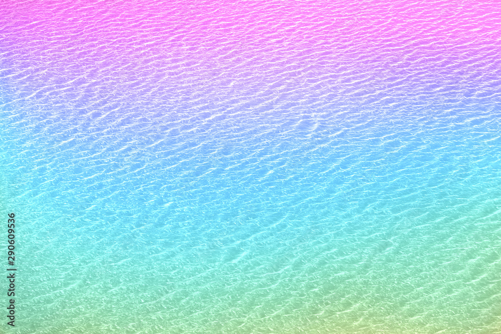 Calm river water surface with water splashes with rainbow pastel color ...