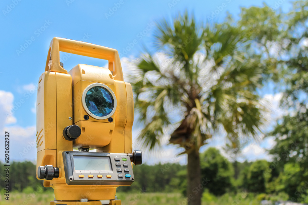 Electronic distance measurement device used for land surveying with ...