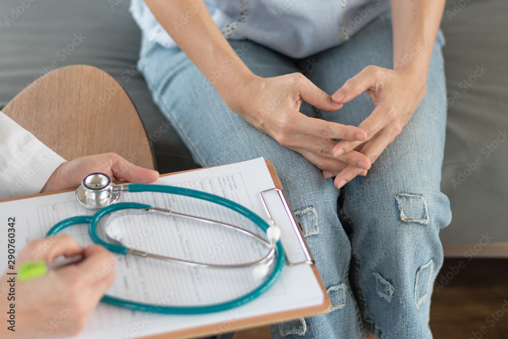 Woman's hand on chest with red spot as suffering on chest pain. Female ...