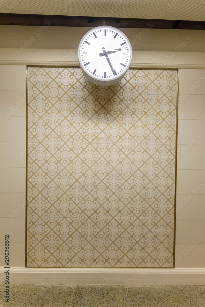 Clock at the wall in Itsaraphap Station of New MRT electric train in ...